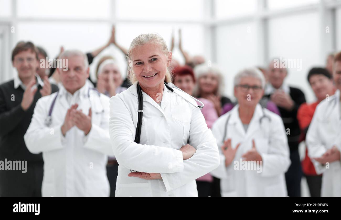 Group doctors and patients clapping their hands to celebrate recovery ...