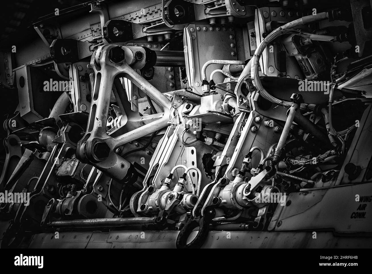 Grayscale of an airplane folded wing Stock Photo - Alamy