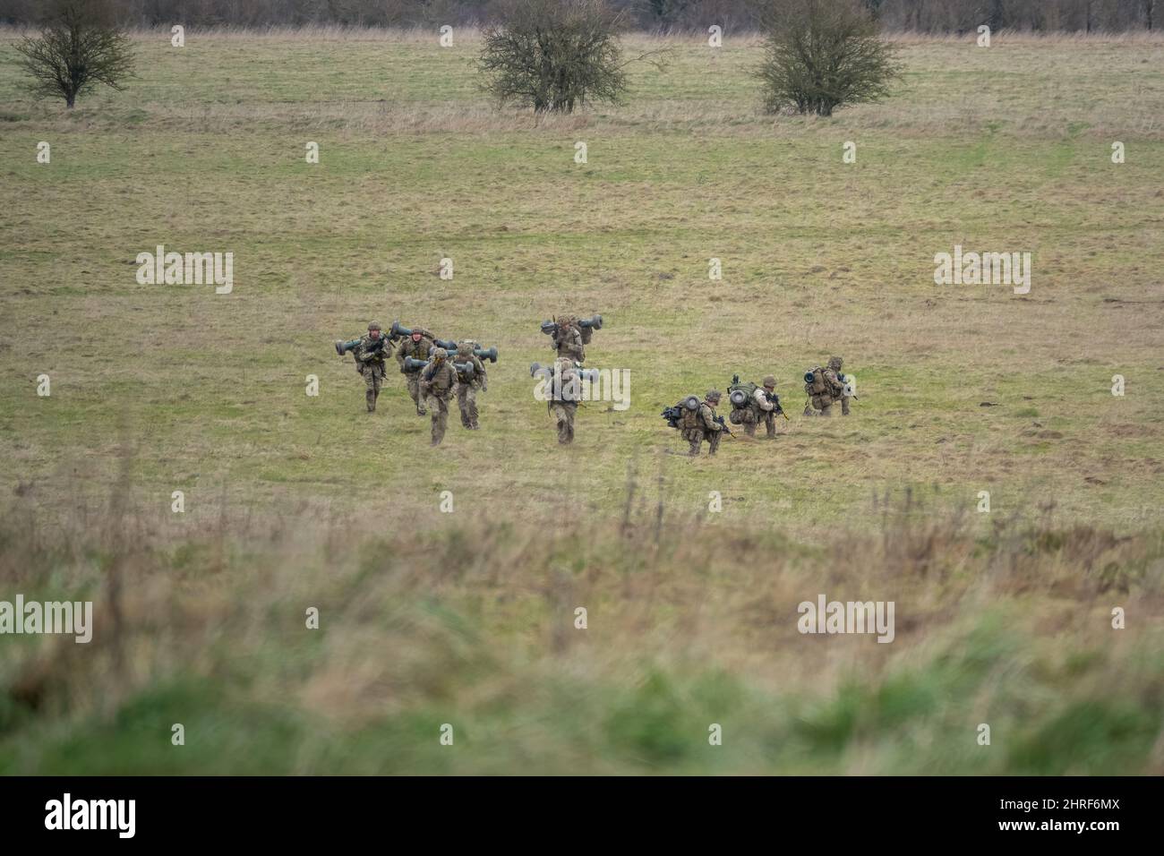 army soldiers on a military tabbing exercise with 40Kg bergen and anti ...