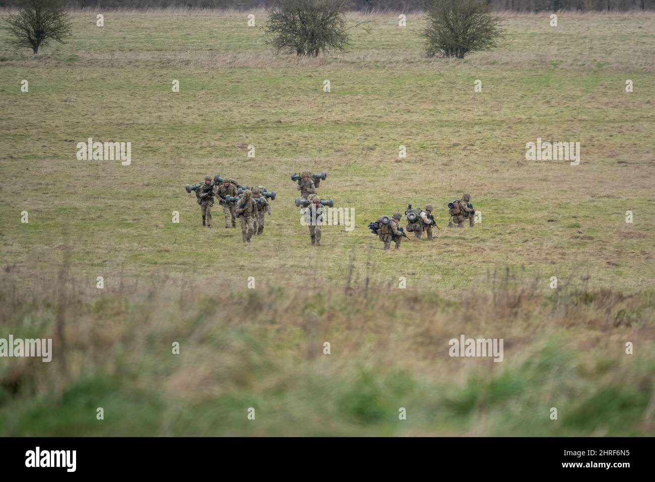army soldiers on a military tabbing exercise with 40Kg bergen and anti ...