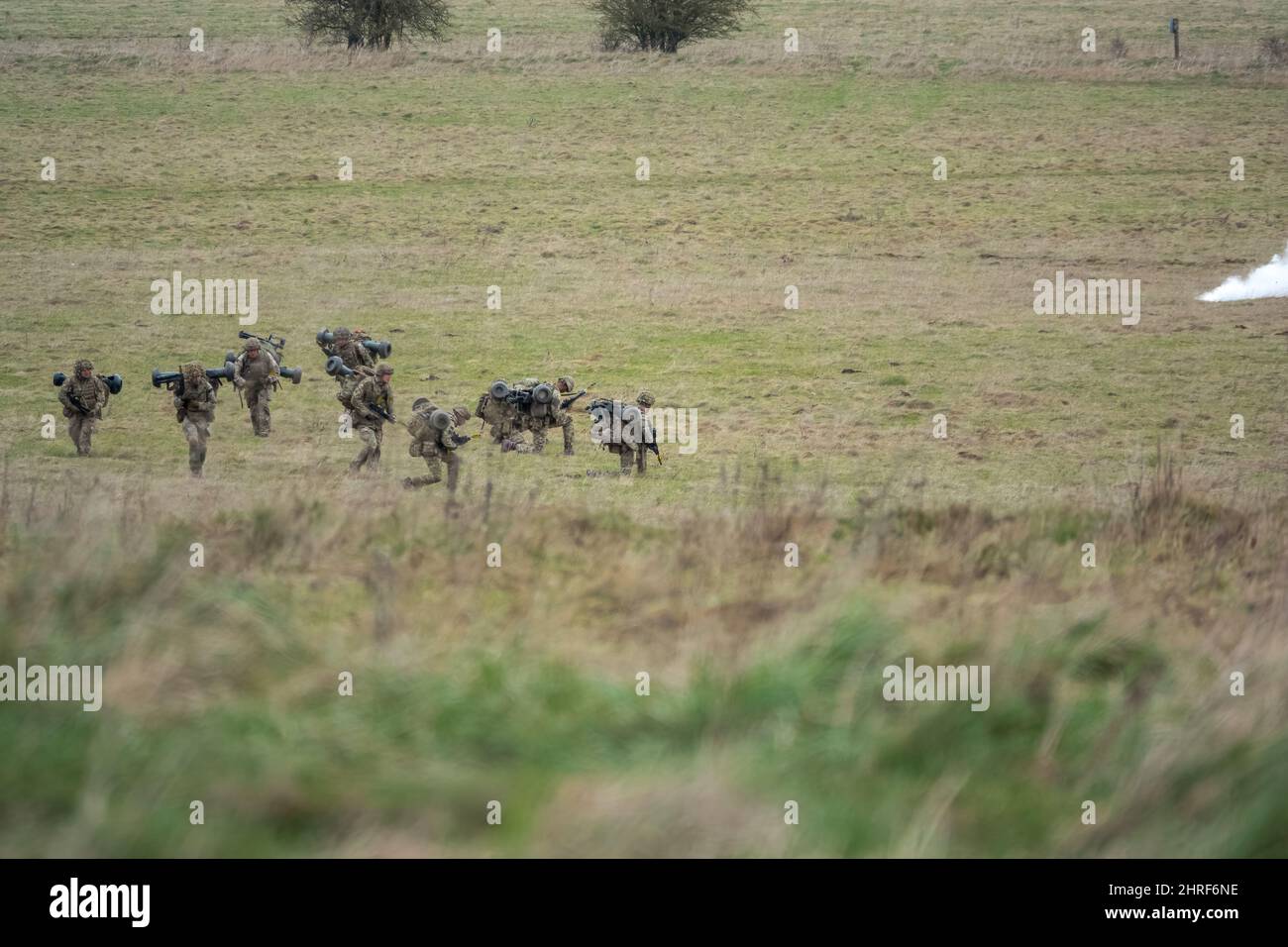 army soldiers on a military tabbing exercise with 40Kg bergen and anti ...