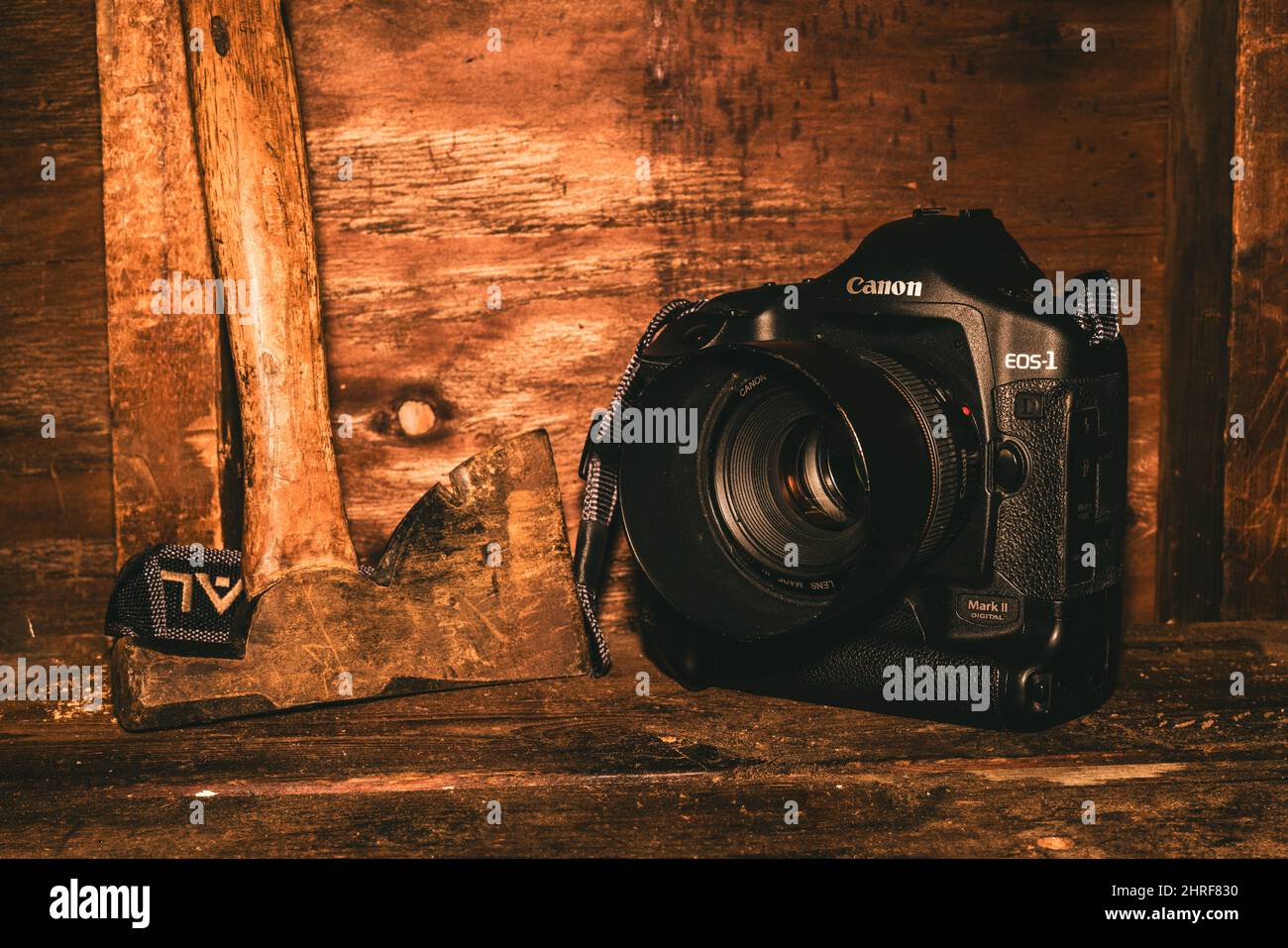 Canon EOS 1D Mark II professional camera on a wooden surface Stock ...