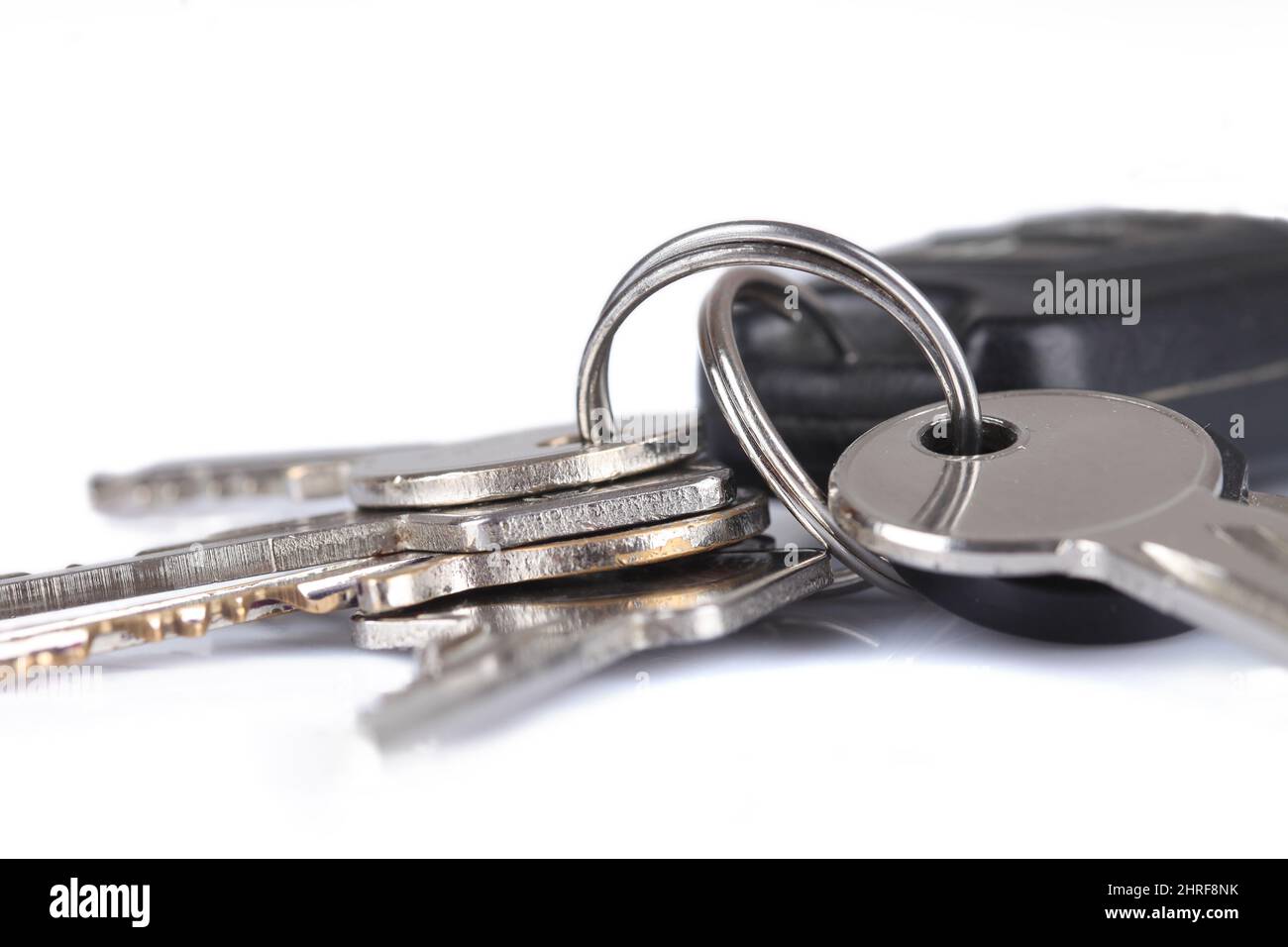 Macro shot of metallic keys isolated on a white background Stock Photo ...