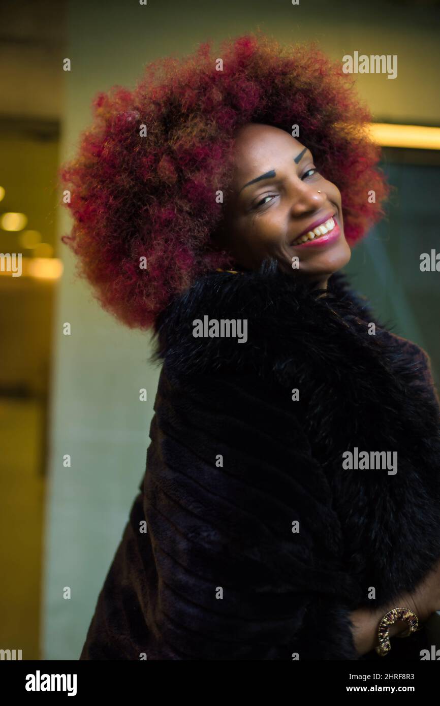 Red hair African woman posing for the camera Stock Photo - Alamy