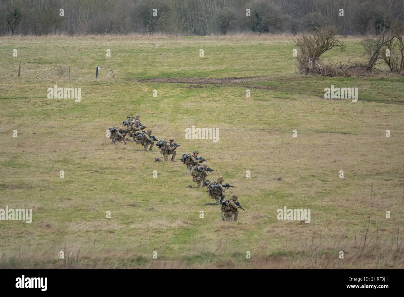 army soldiers on a military tabbing exercise with 40Kg bergen and anti ...
