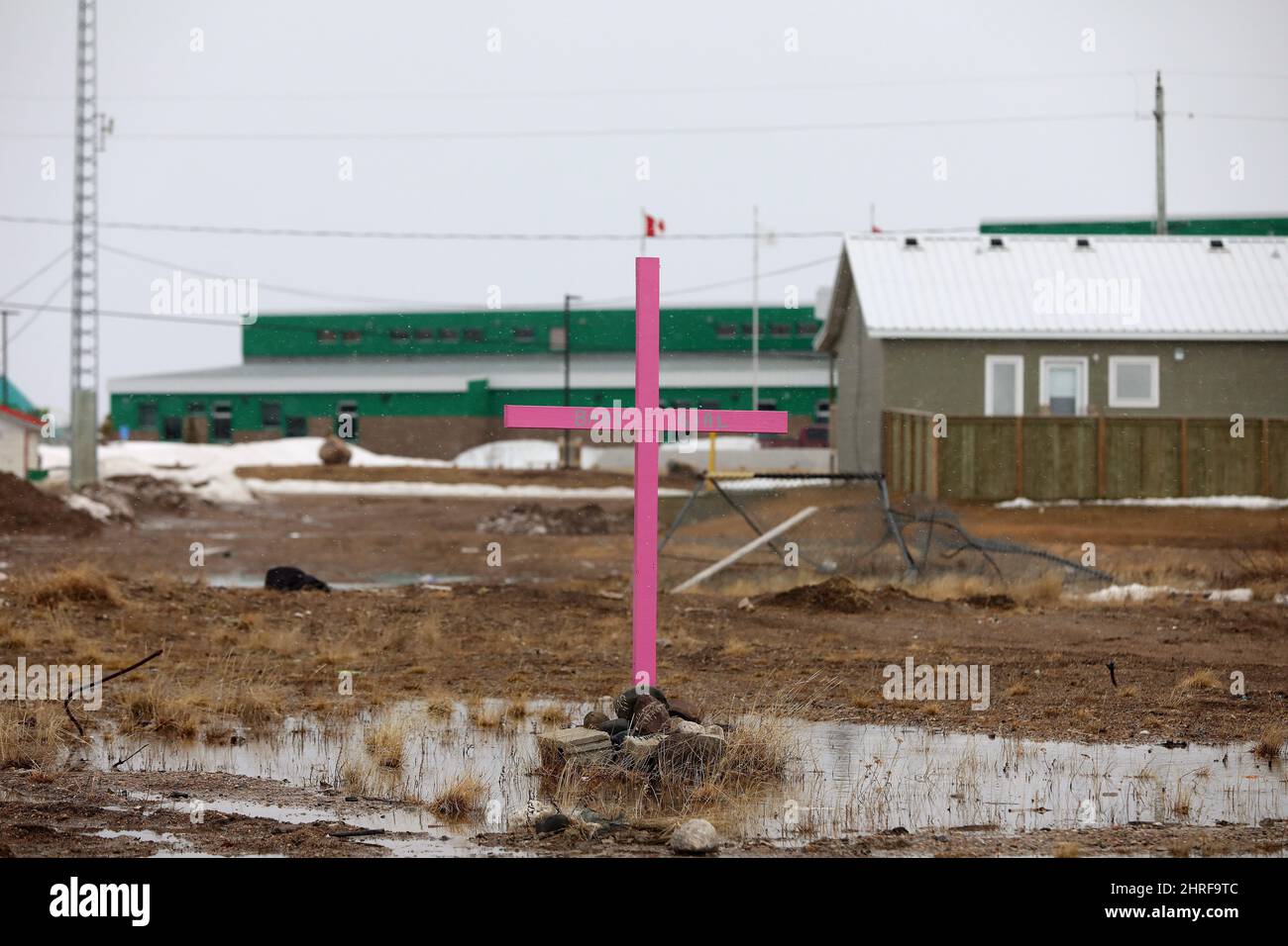 A memorial to a child who died in a house fire is seen in Fort Severn ...