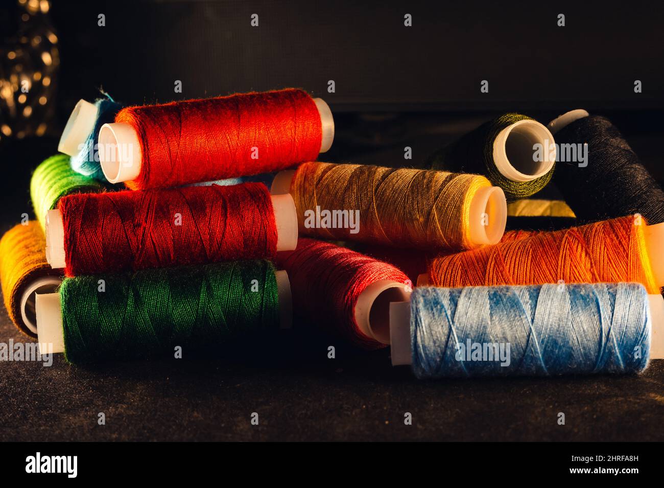 Closeup of colorful nylon threads set on a dark background Stock Photo ...