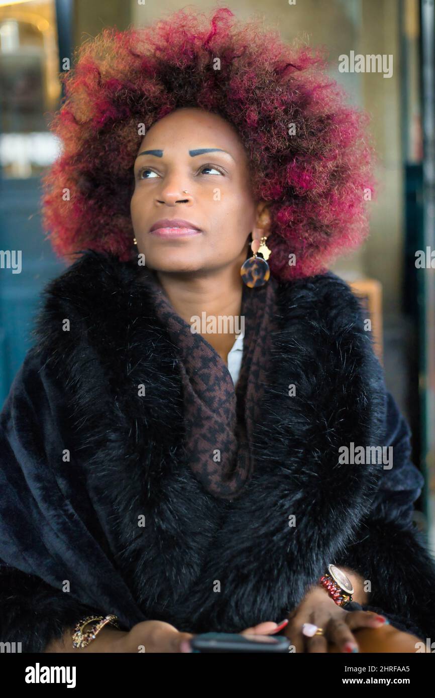 Red hair African woman posing for the camera Stock Photo - Alamy