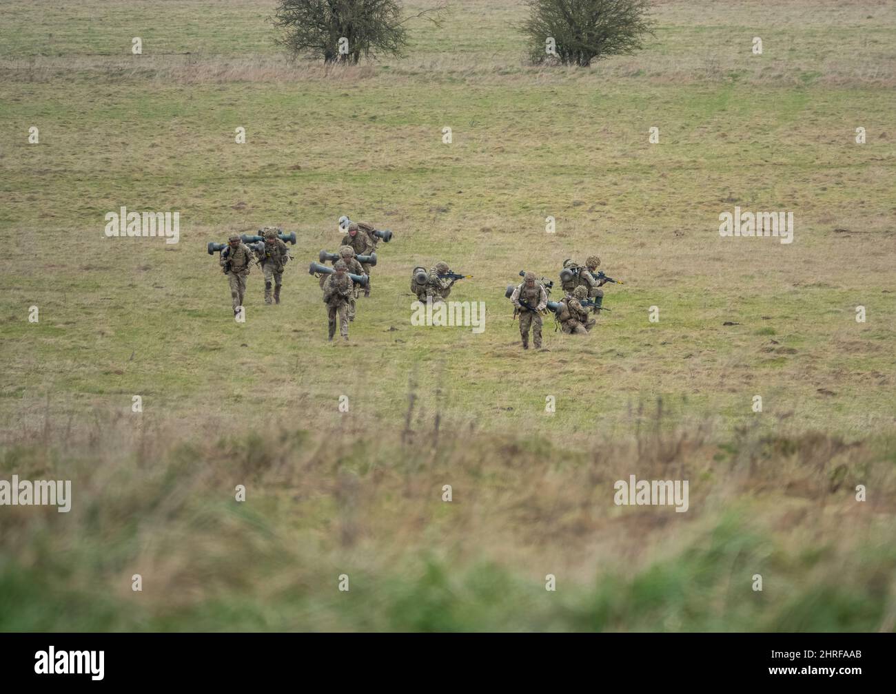 army soldiers on a military tabbing exercise with 40Kg bergen and anti ...