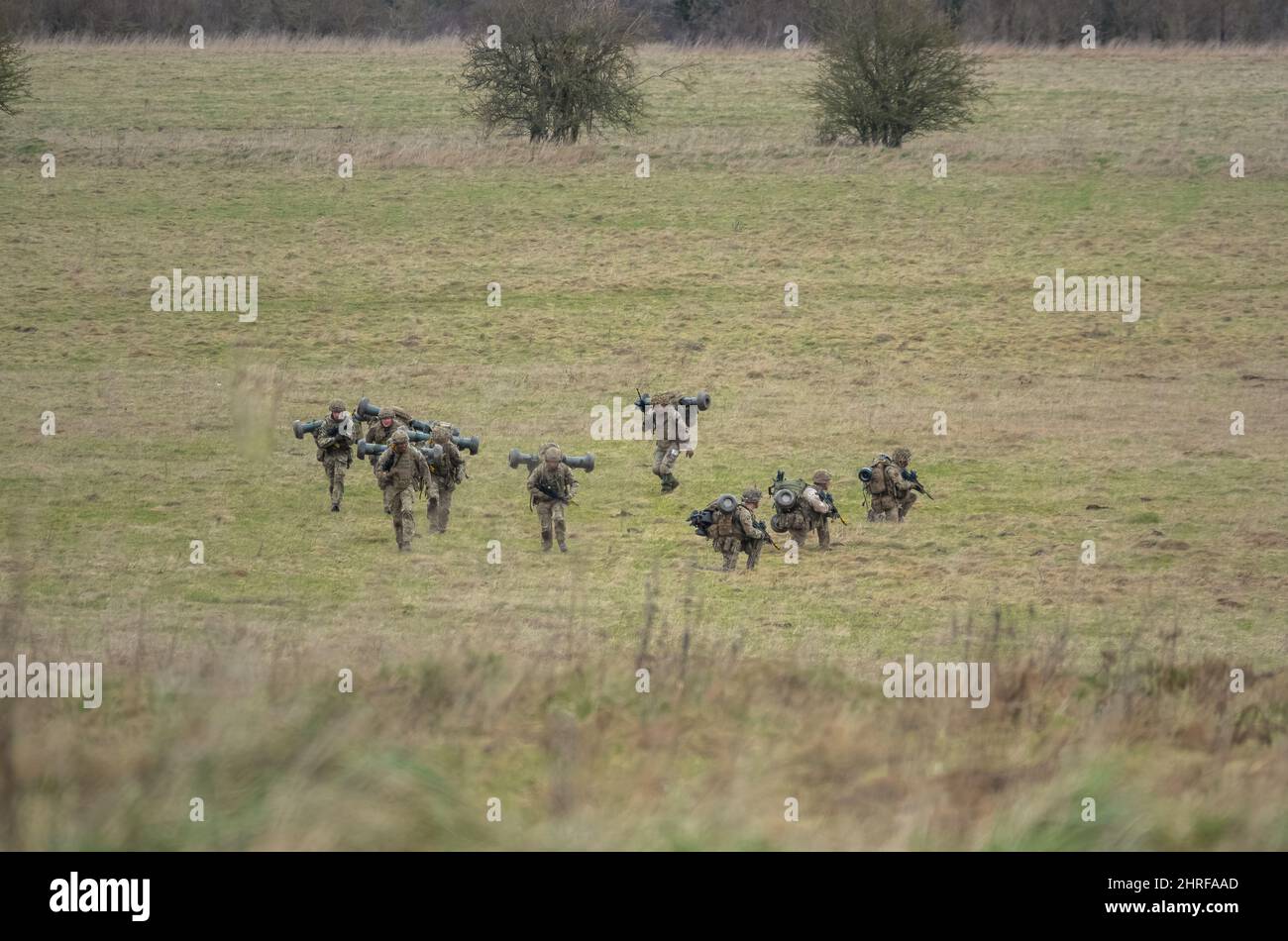 army soldiers on a military tabbing exercise with 40Kg bergen and anti ...