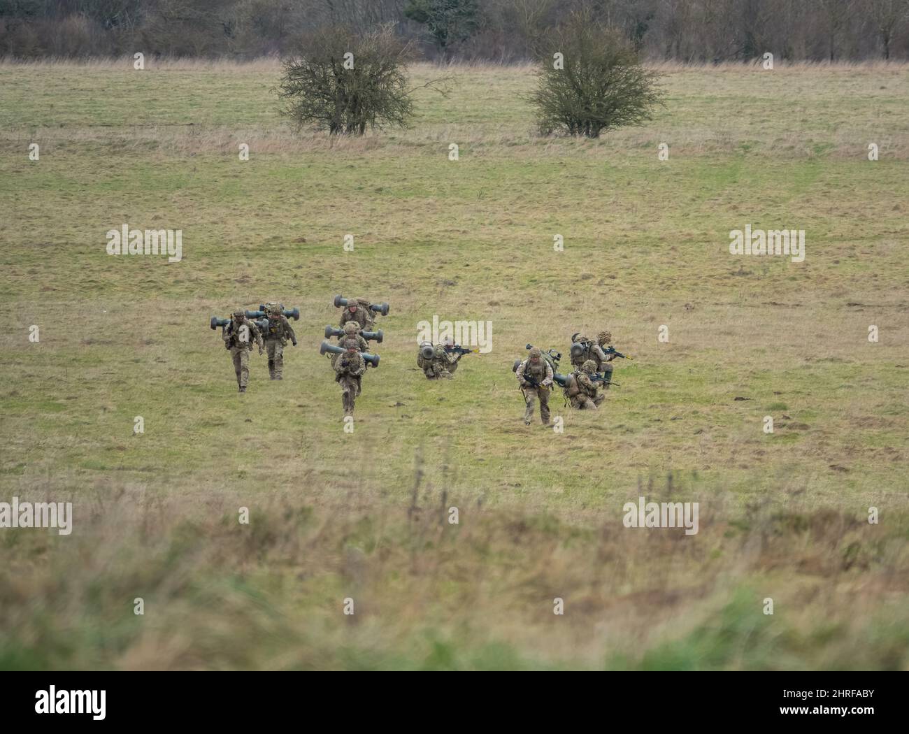 army soldiers on a military tabbing exercise with 40Kg bergen and anti ...