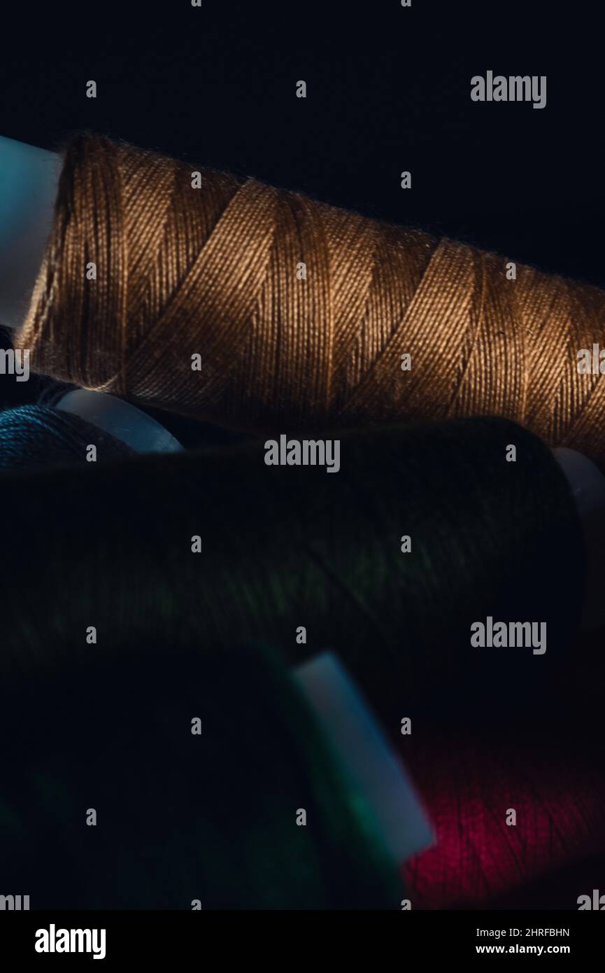 Dark brown threads hi-res stock photography and images - Alamy