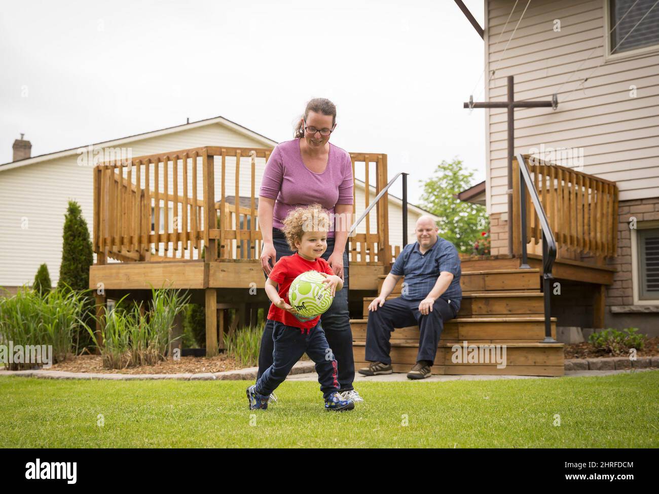 Erin and John Stitt with play with their two-year-old son, Michael, in ...
