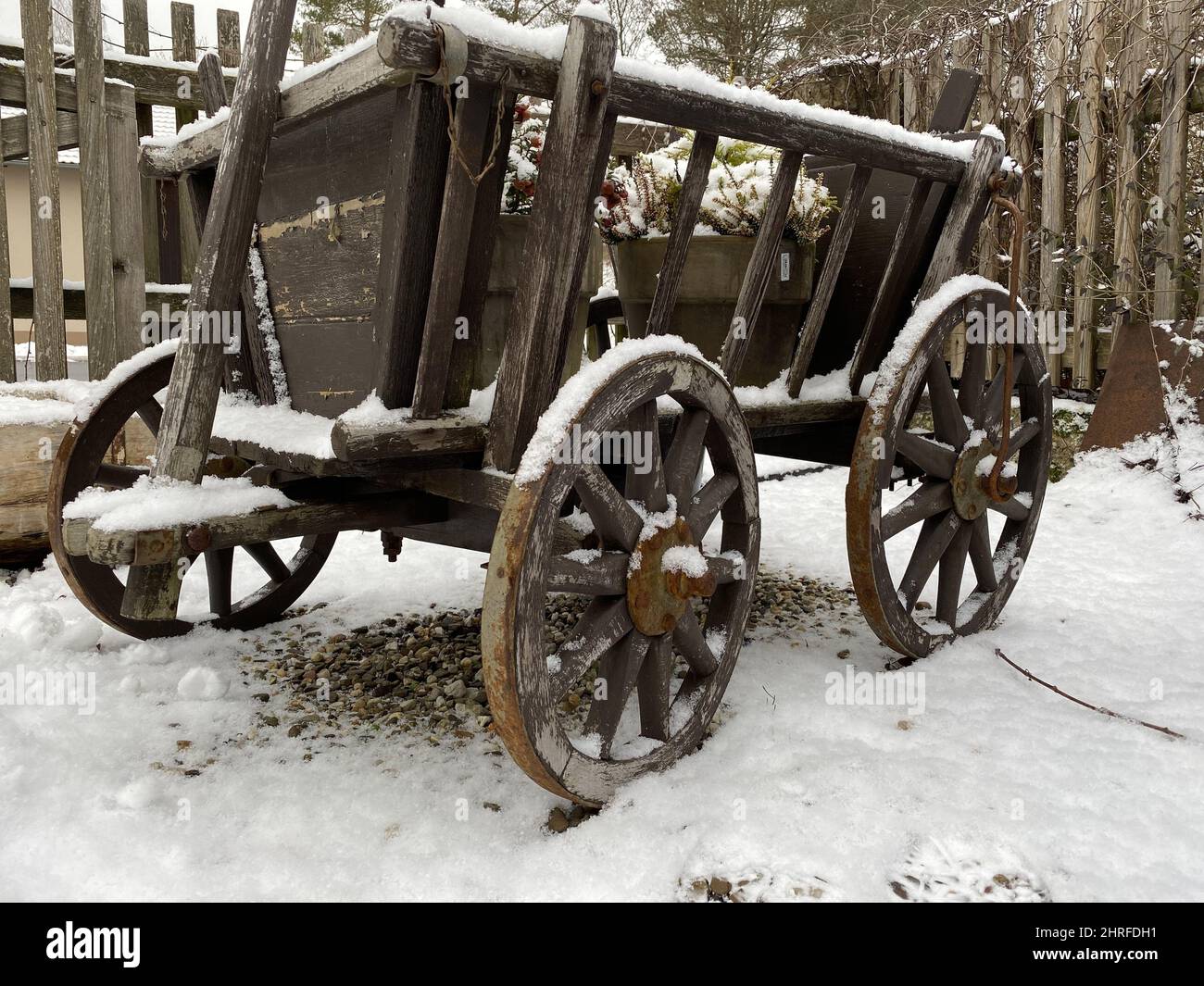 Old wooden chariot in snow Stock Photo - Alamy
