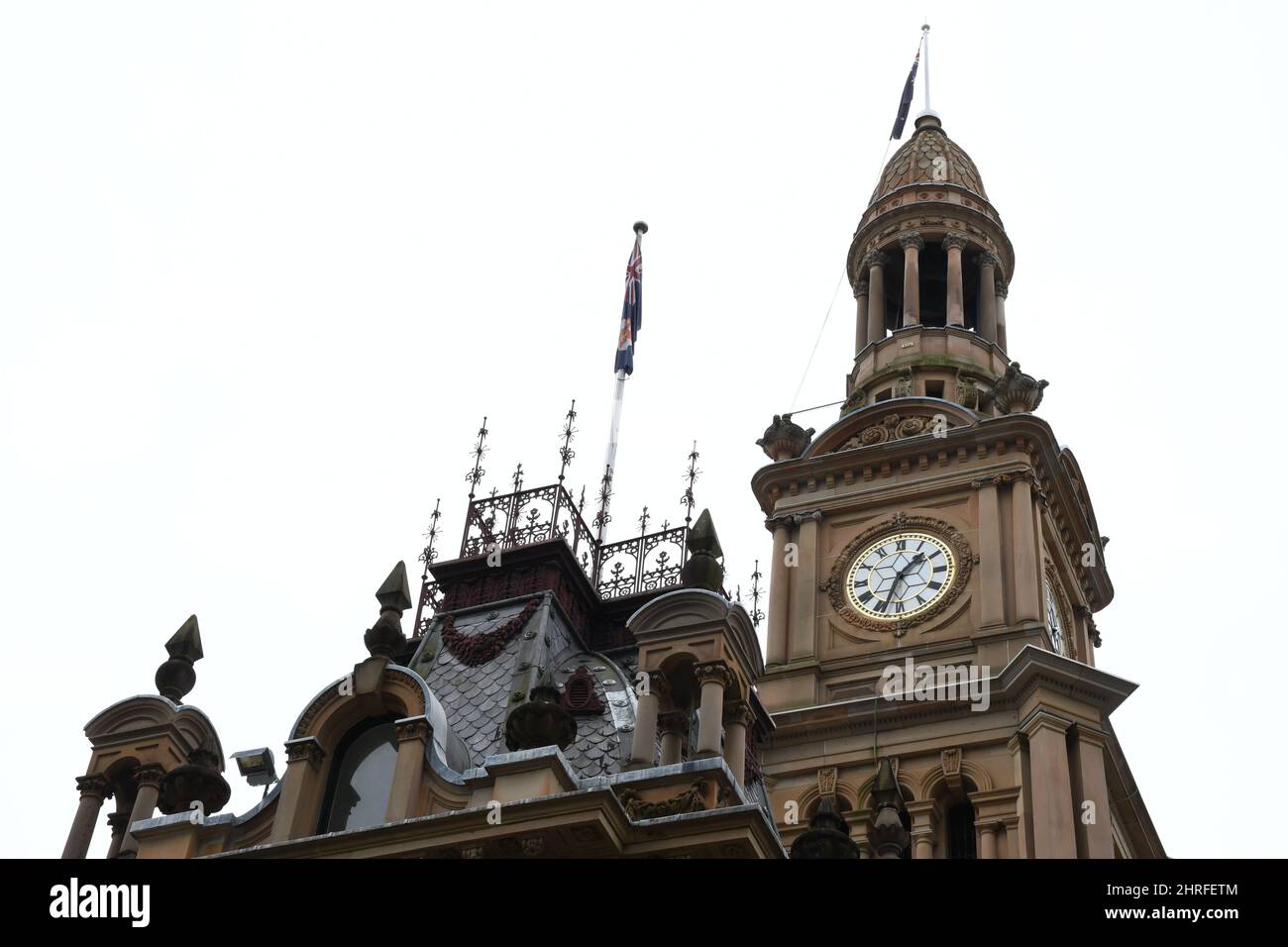 Low angle shot of the clock tower of the historical Town Hall of Sydney ...