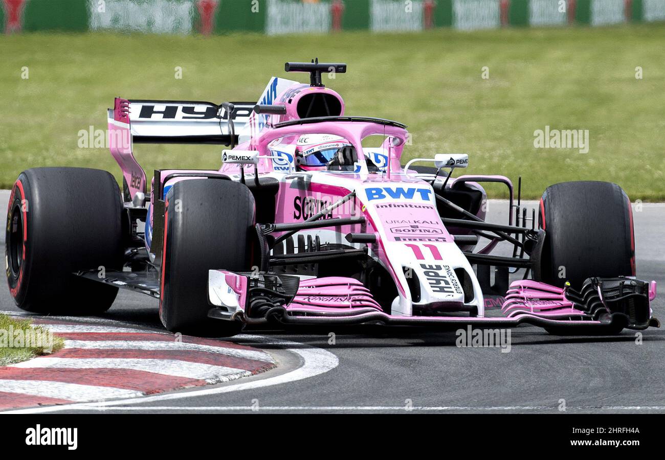 Force India driver Sergio Perez of Mexico rounds the Senna corner ...