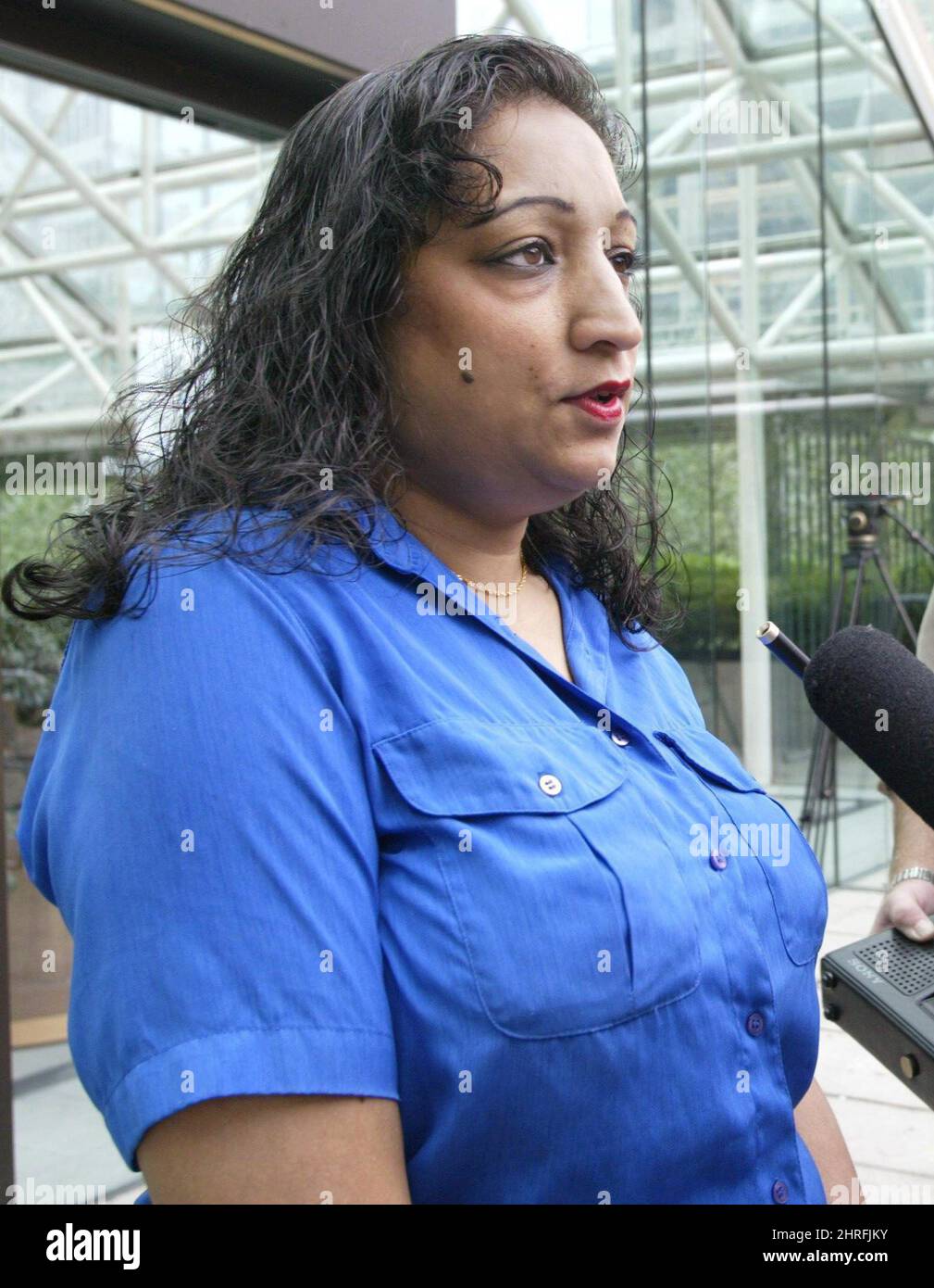 Suman Virk, mother of murder victim Reena Virk, speaks to reporters ...