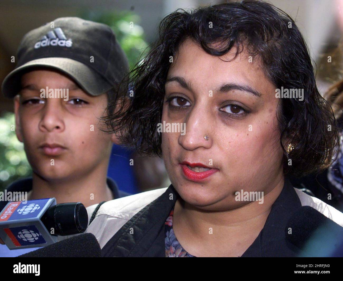 Suman Virk, mother of murdered teen Reena Virk, and her son Aman, left ...