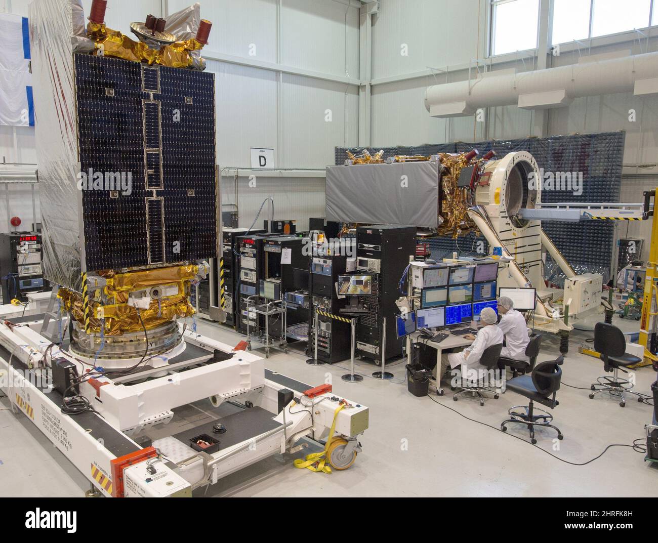 Technicians put the final touches on two of three Radarsat ...