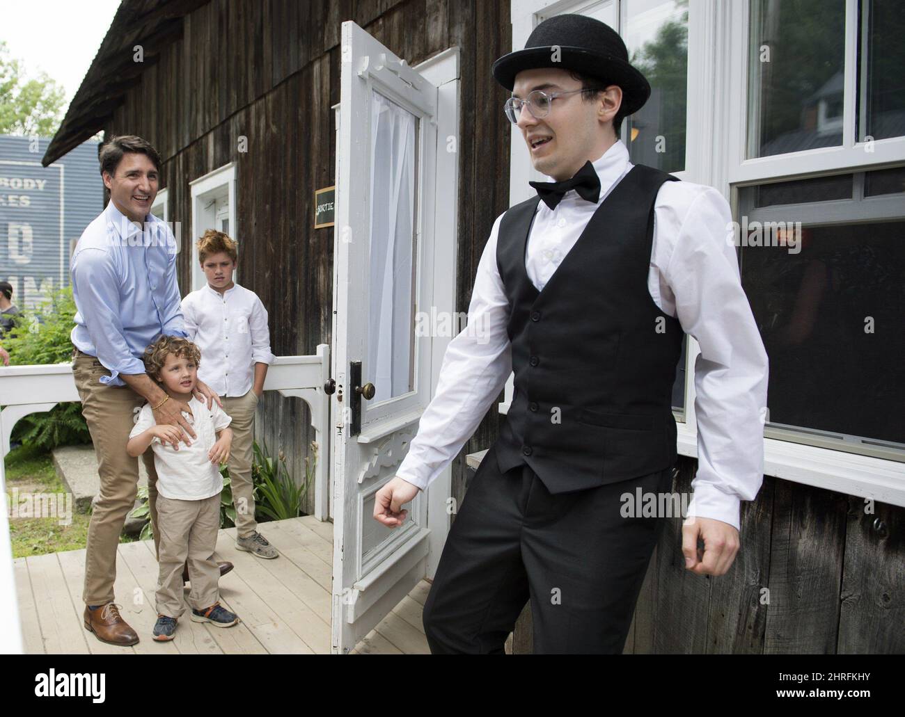 Prime Minister Justin Trudeau and sons Hadrien and Xavier, right, look ...