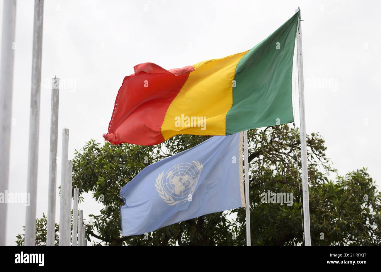 A UN flag and Mali flag fly on the MINUSMA Main Operations Base in ...