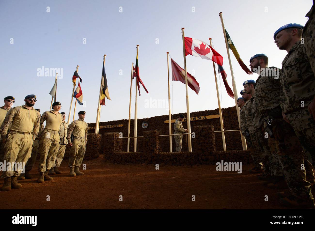 Canadian troops, left, and German troops, right, take part in a ...