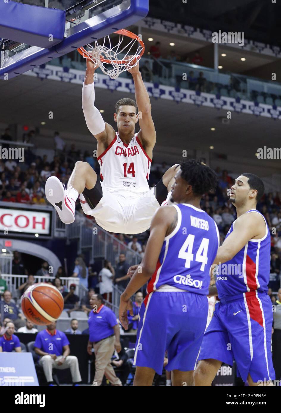 Canada's Dwight Powell goes up for a slam dunk against the Dominican ...