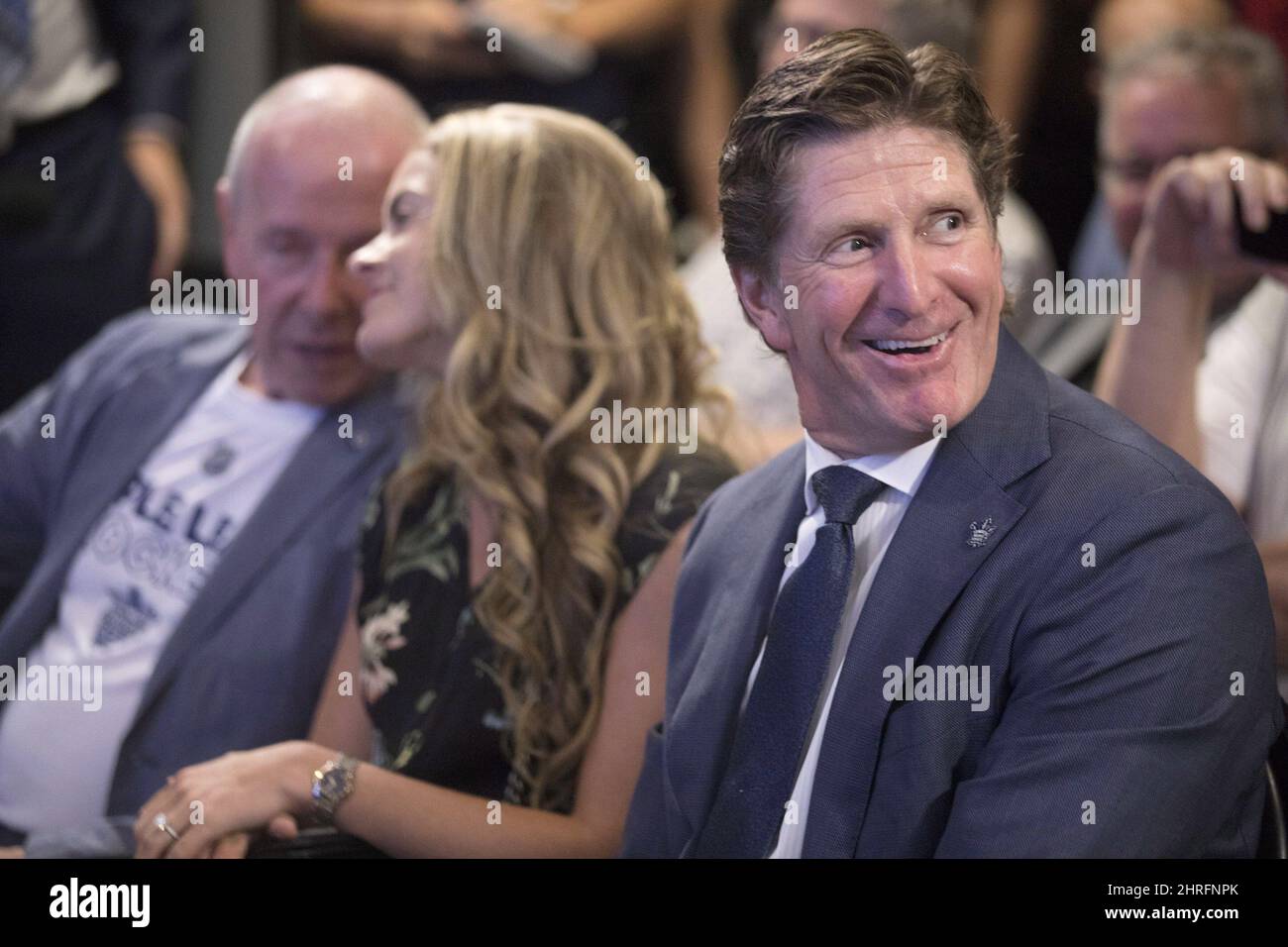 Toronto Maple Leafs Head Coach Mike Babcock (right) sits alongside John ...
