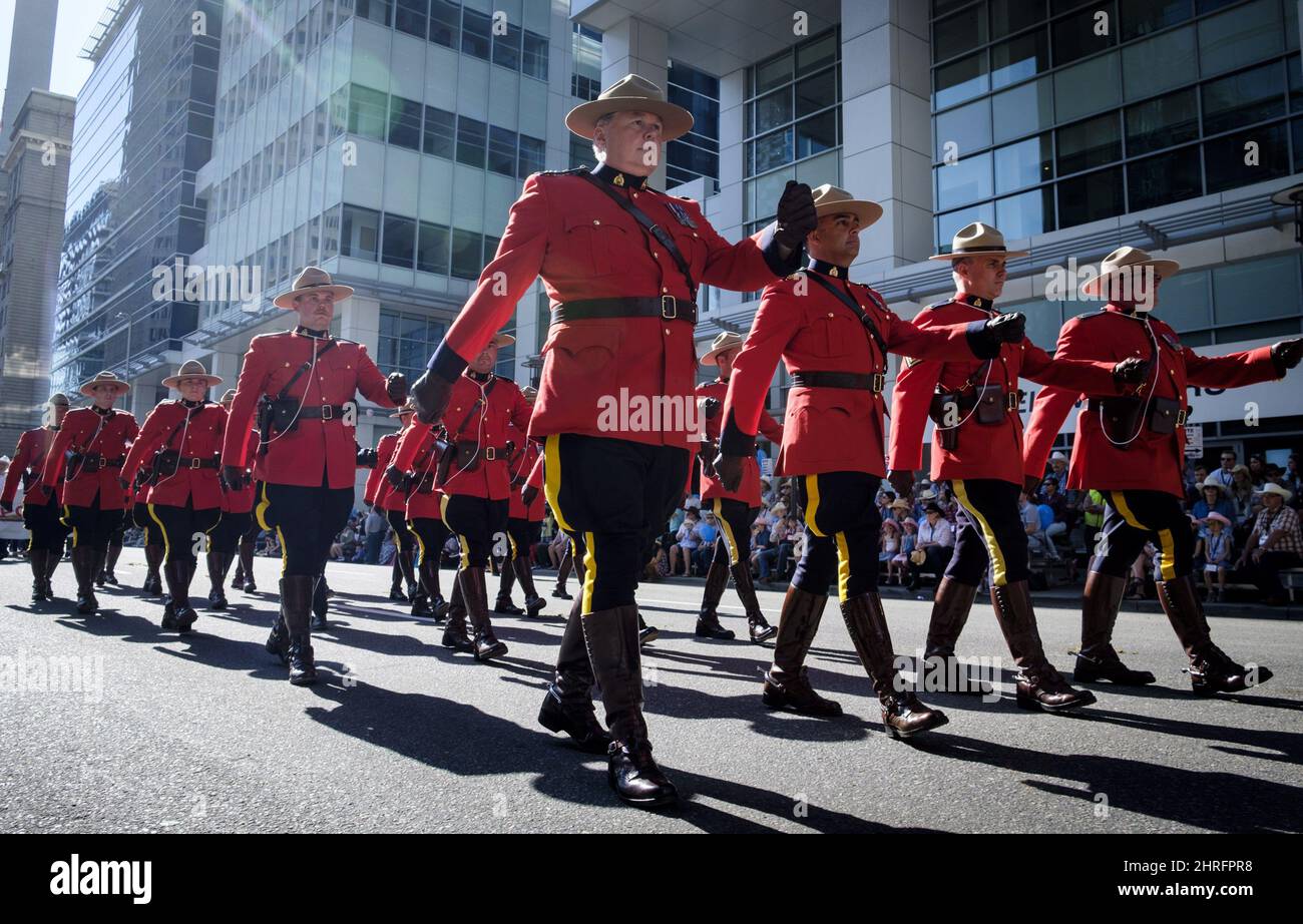 Members Of The Rcmp March During The Calgary Stampede Parade In Calgary Friday July 6 2018 3794