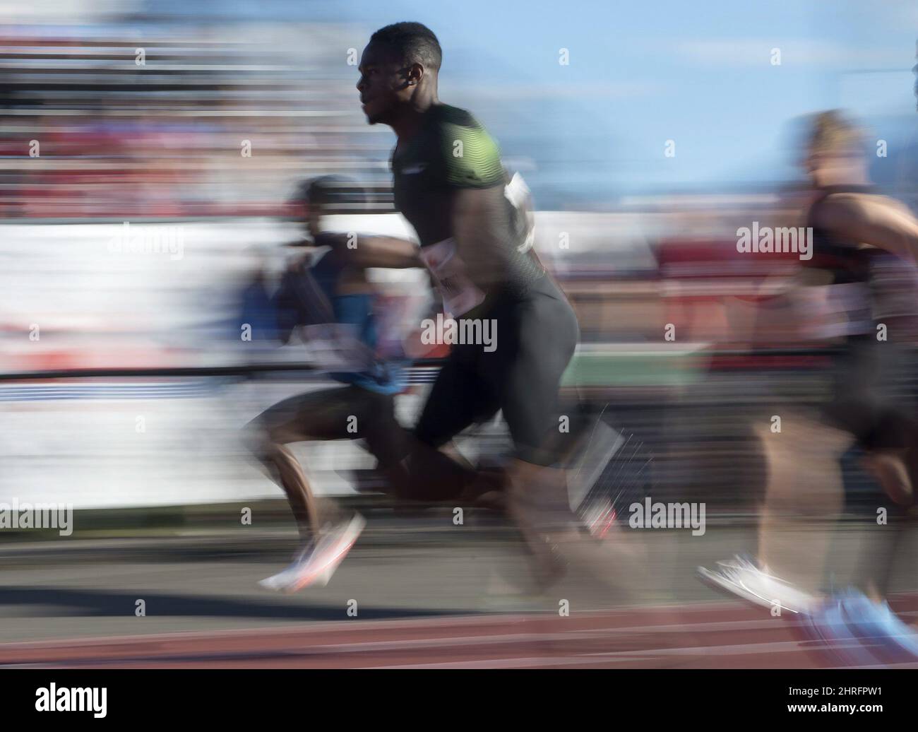 Aaron Brown zooms down the track in men's 100m semifinal competition at ...