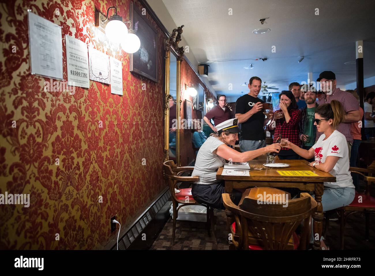 "Toe Captain" Sue Taylor, left, toasts with Heather McRobbie, right, as ...