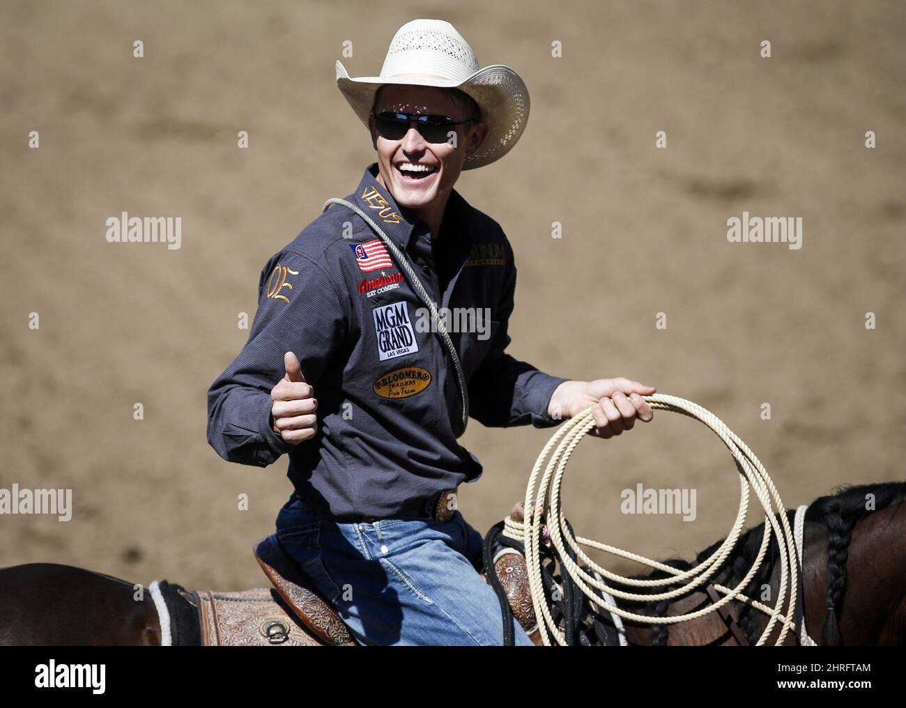 Tuf Cooper, of Weatherford, Texas, celebrates winning the Tie-Down ...