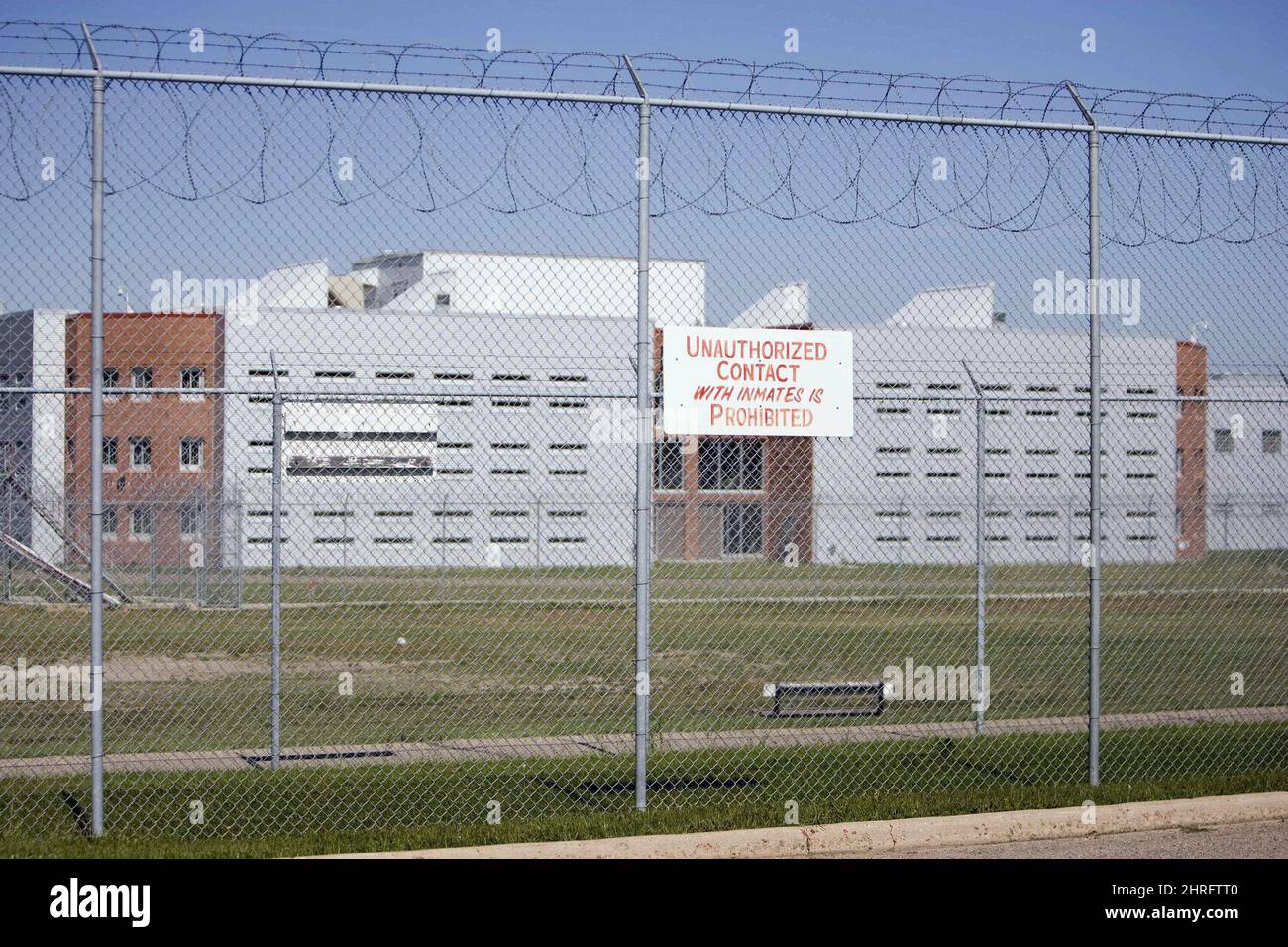 A sign marks the perimeter of the Regina Correctional Centre on August ...
