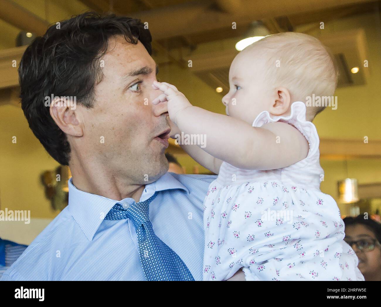 Prime Minister Justin Trudeau makes a face at five-month-old Aislin ...