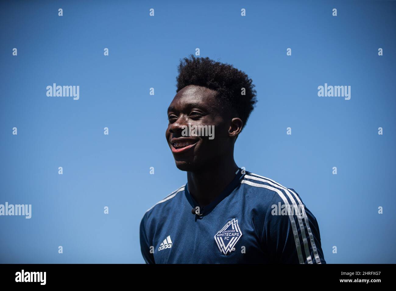Vancouver Whitecaps midfielder Alphonso Davies smiles during an ...
