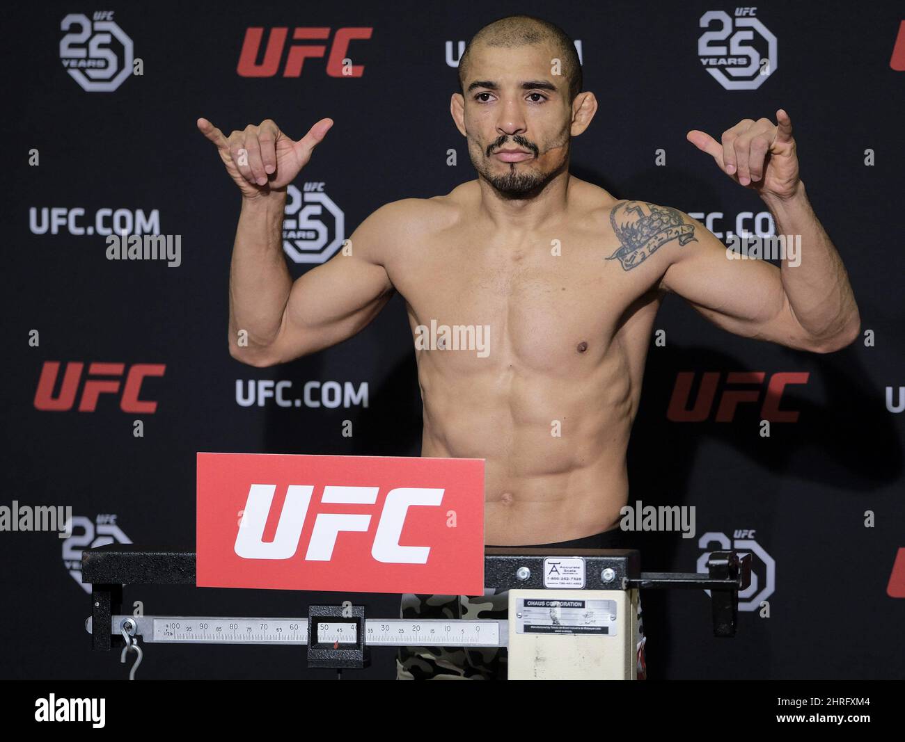 UFC featherweight fighter Jose Aldo flexes during weigh-ins in Calgary ...