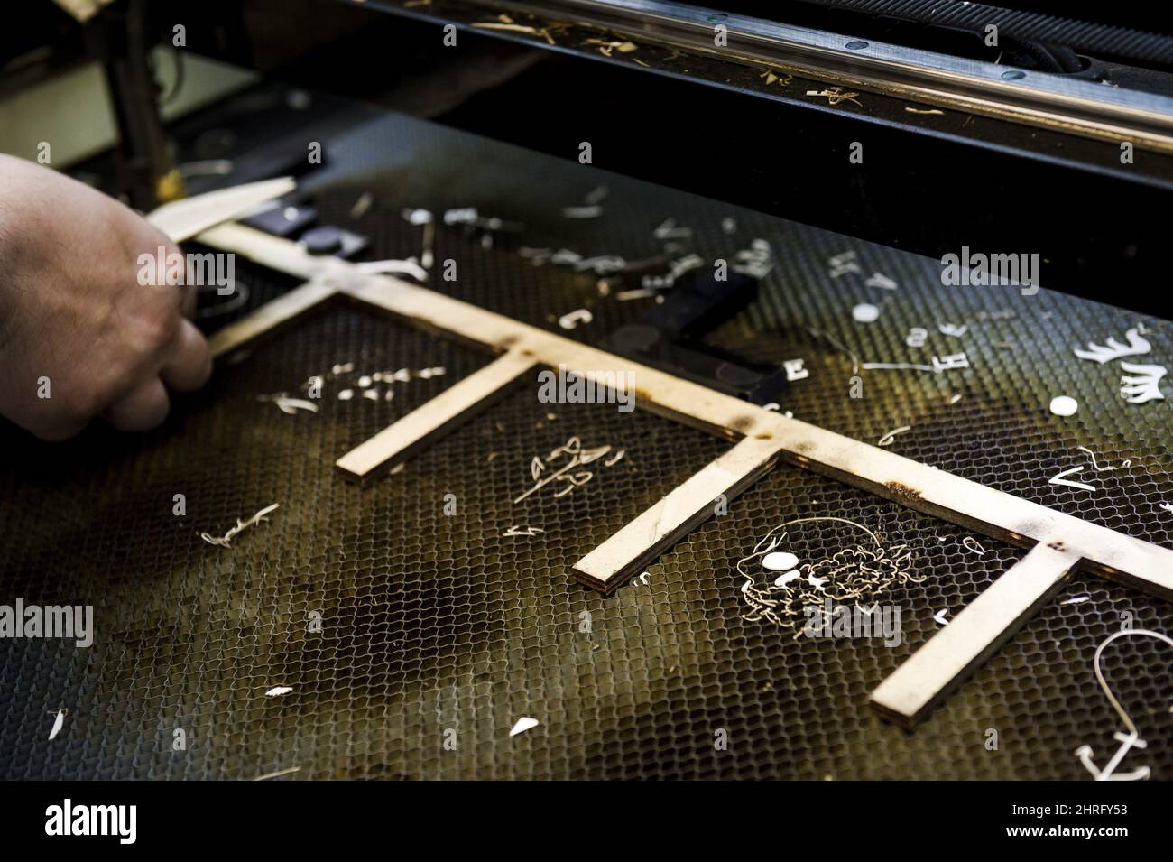 A laser cutter used to make tattoo designs is photographed in Inkbox, a ...