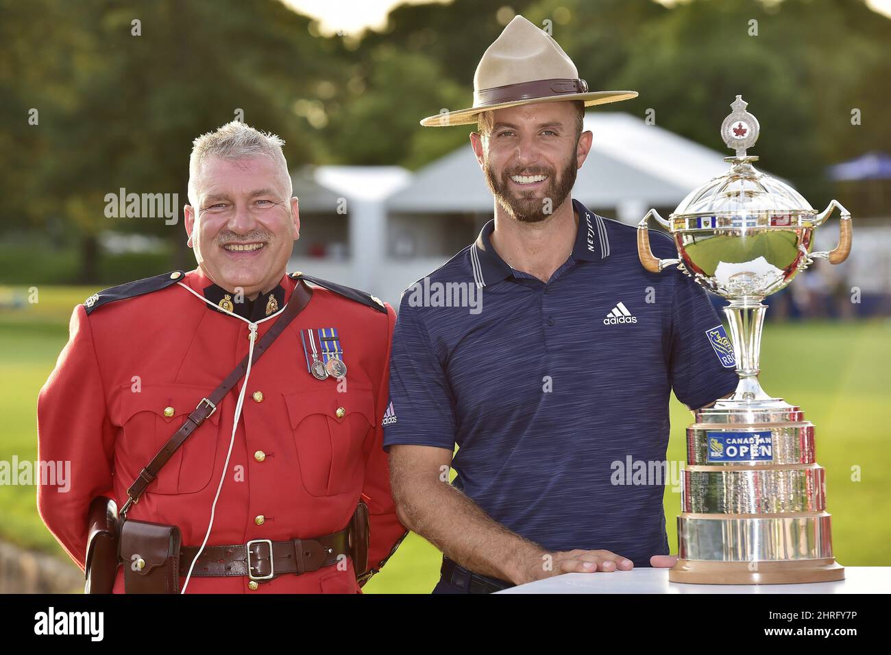 Dustin Johnson, of the United States, poses with a Royal Canadian ...