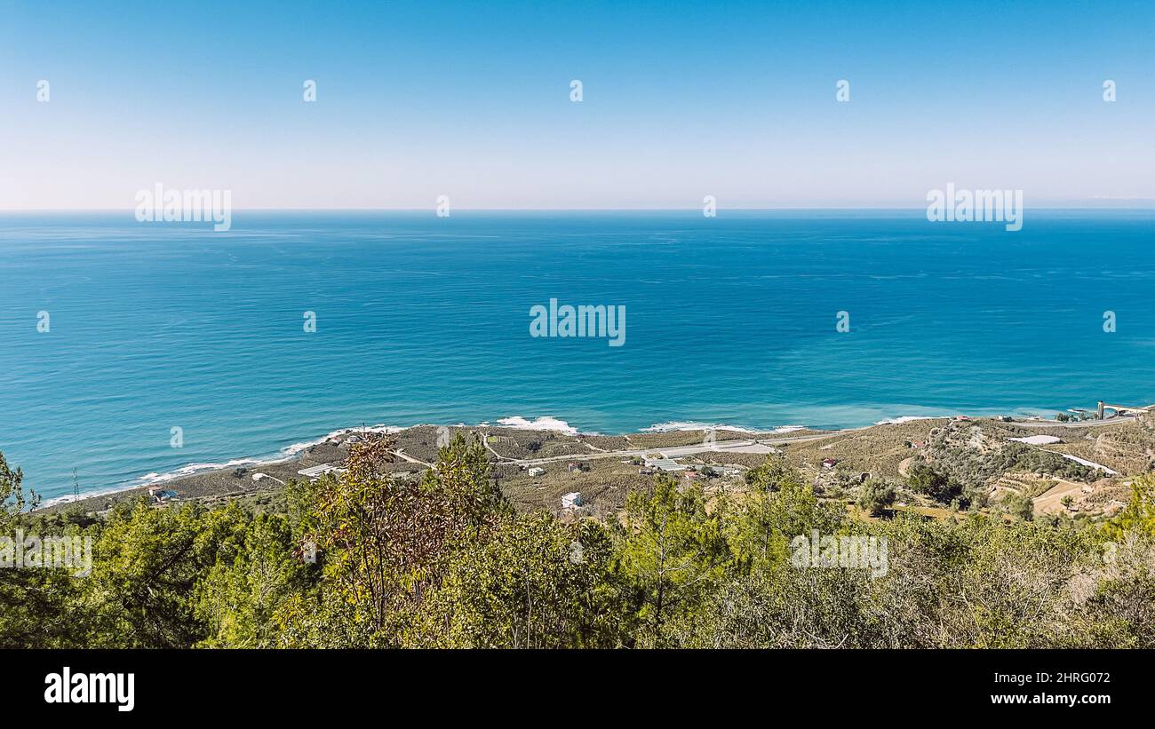 Sea panorama overlooking a small town, mountains and coastline Stock ...