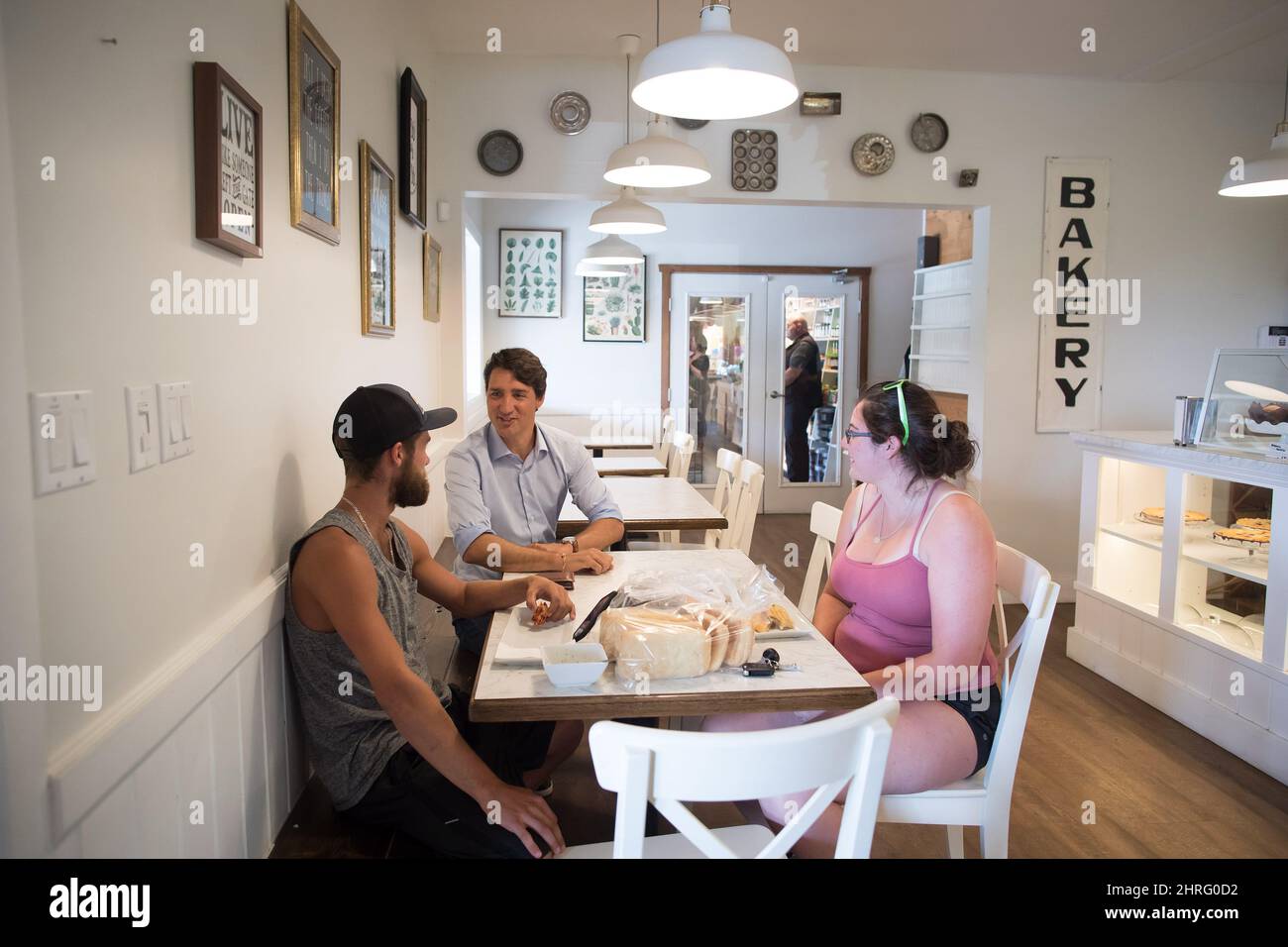 Prime Minister Justin Trudeau, second left, stops to talk with Jackson ...