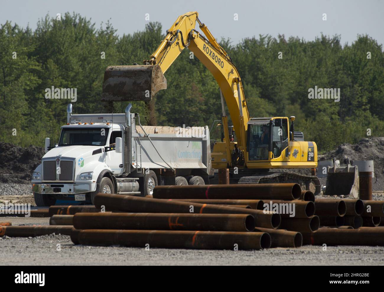 Heavy equipment works on the site of a future Amazon distribution ...