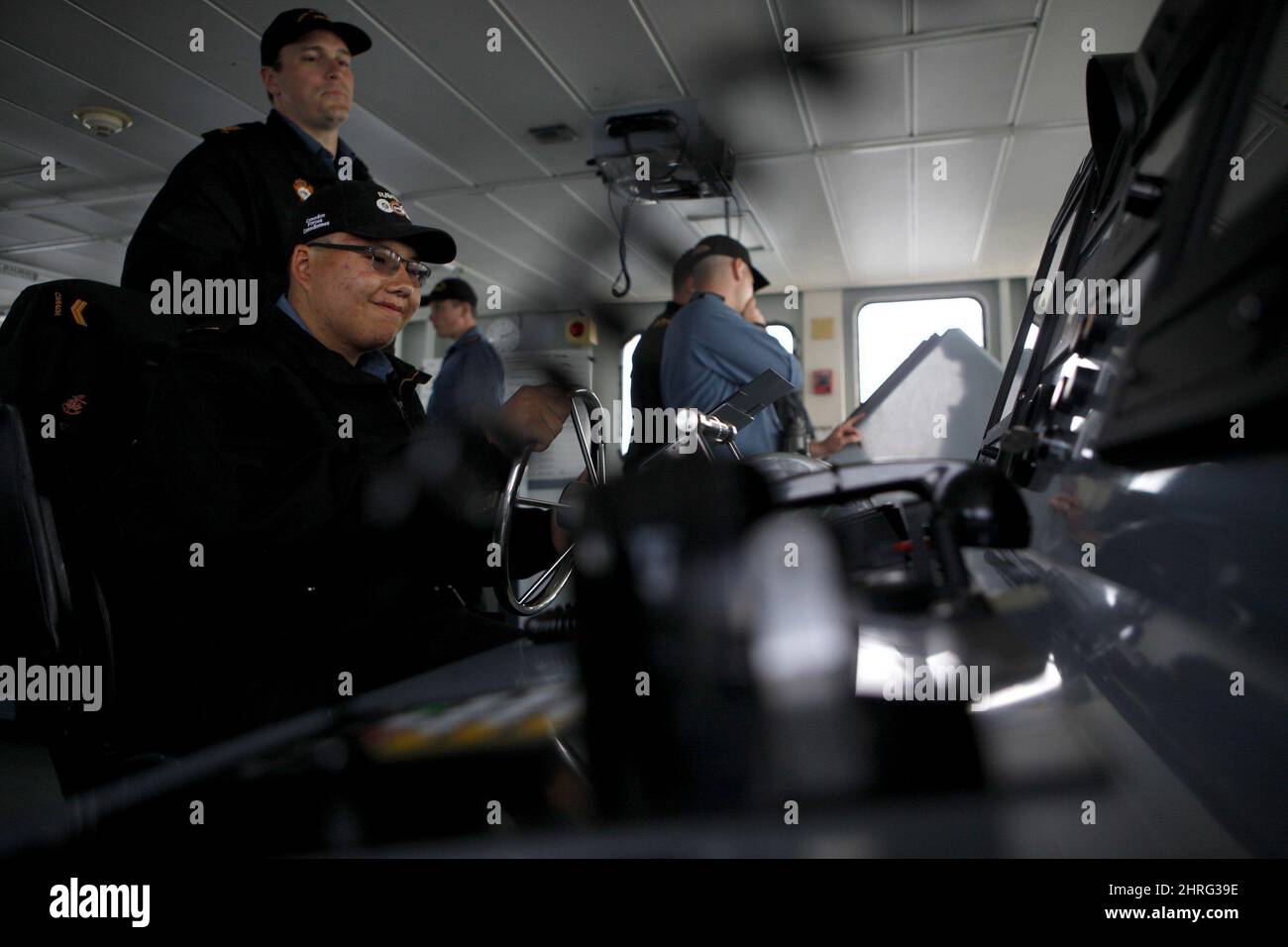 Master Seaman James Poirier watches over Creed YellowKnee-Beaver as he ...