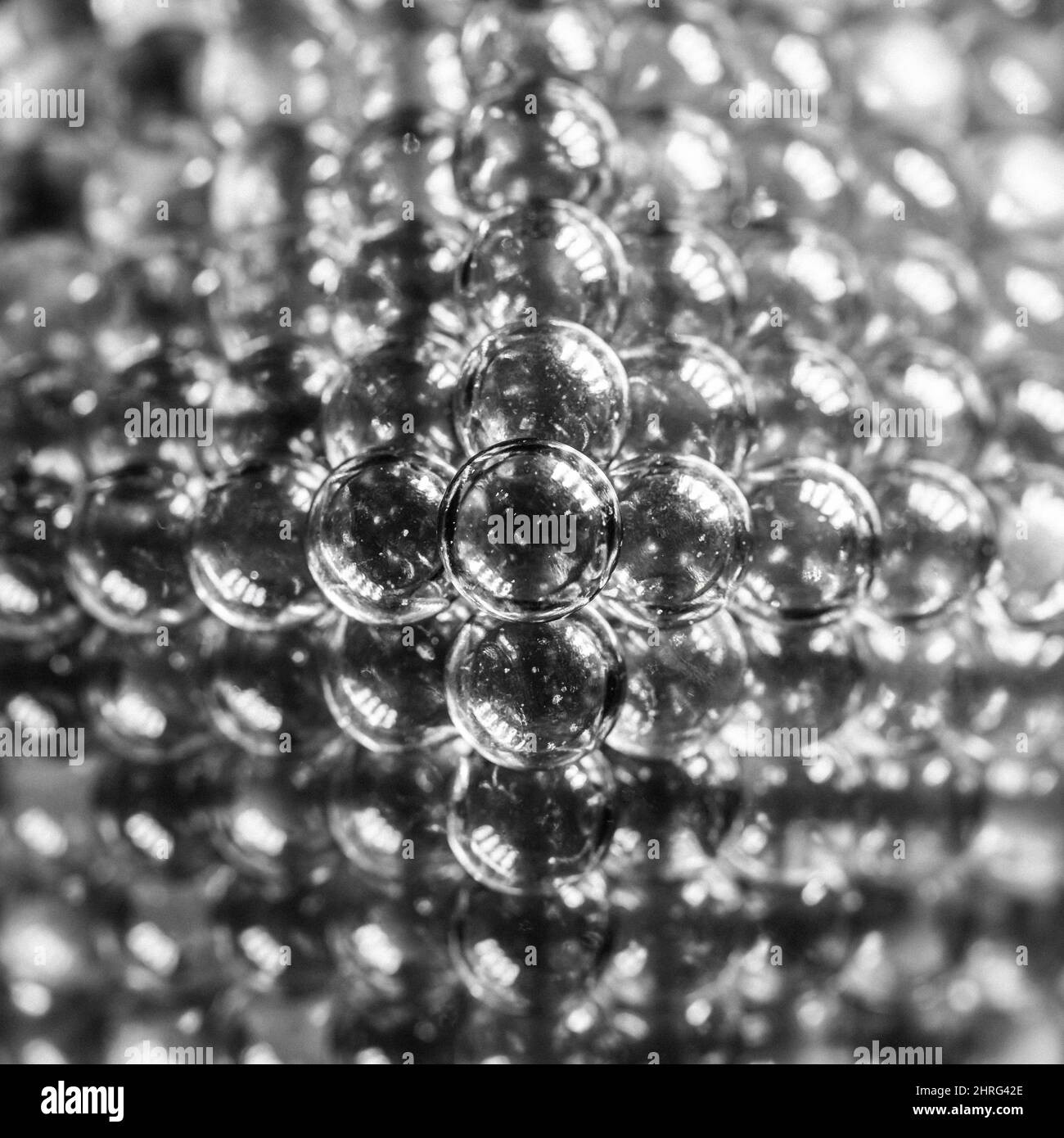 Macro shot of lit grey marbles forming a pyramid Stock Photo - Alamy