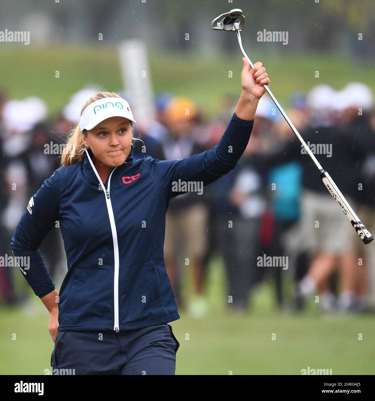 Canada's Brooke Henderson acknowledges the crowd as she arrives on the ...