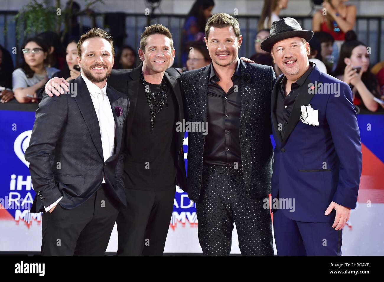 Drew Lachey, Jeff Timmons, Nick Lachey and Justin Jeffre of 98 Degrees ...