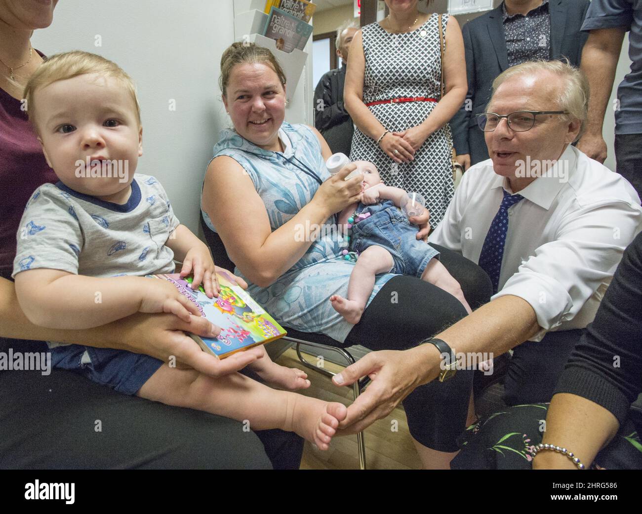 PQ leader Jean-Francois Lisee greets some families before announcing ...