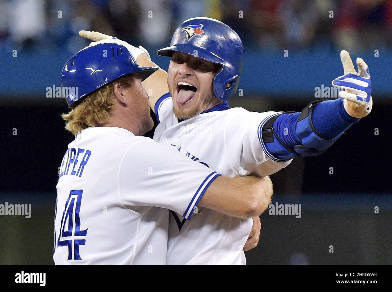 Toronto Blue Jays third baseman Josh Donaldson, right reacts with first ...