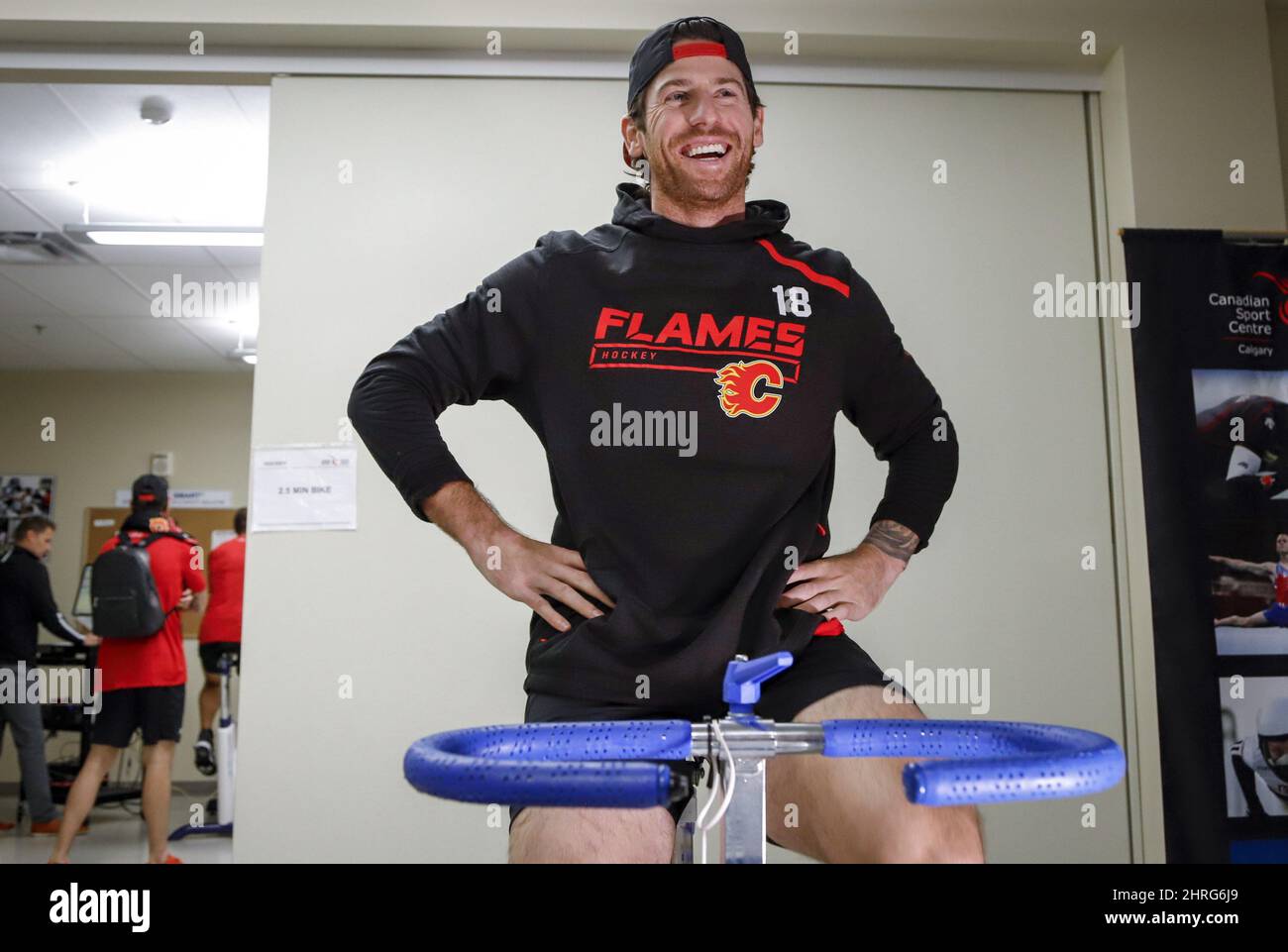 Calgary Flames' James Neal rides an exercise bike during fitness ...