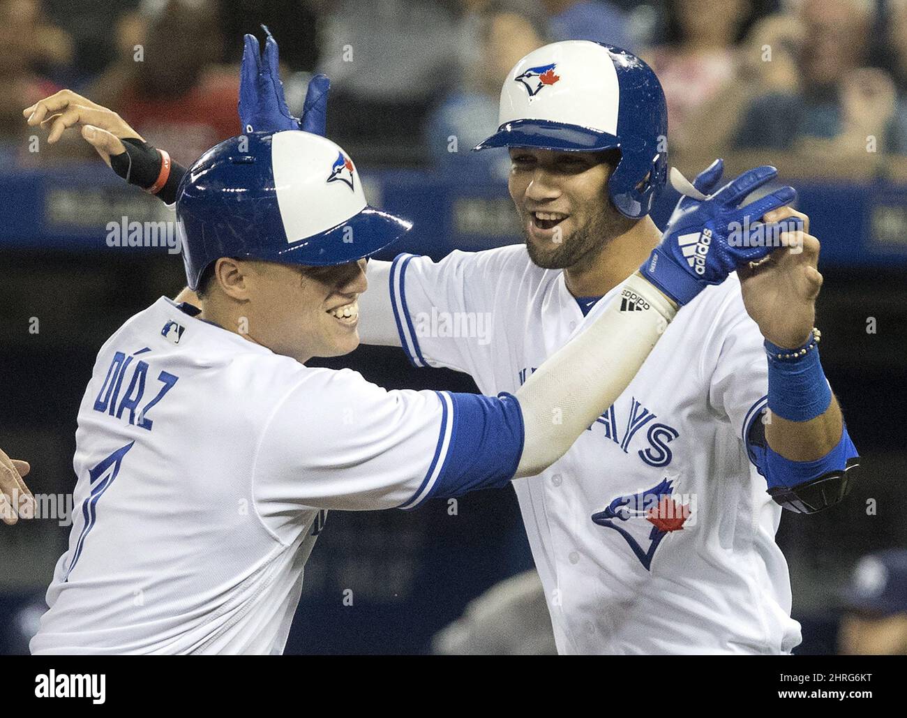 Toronto Blue Jays' Aedmys Diaz met by teammate Lourdes Gurriel Jr ...