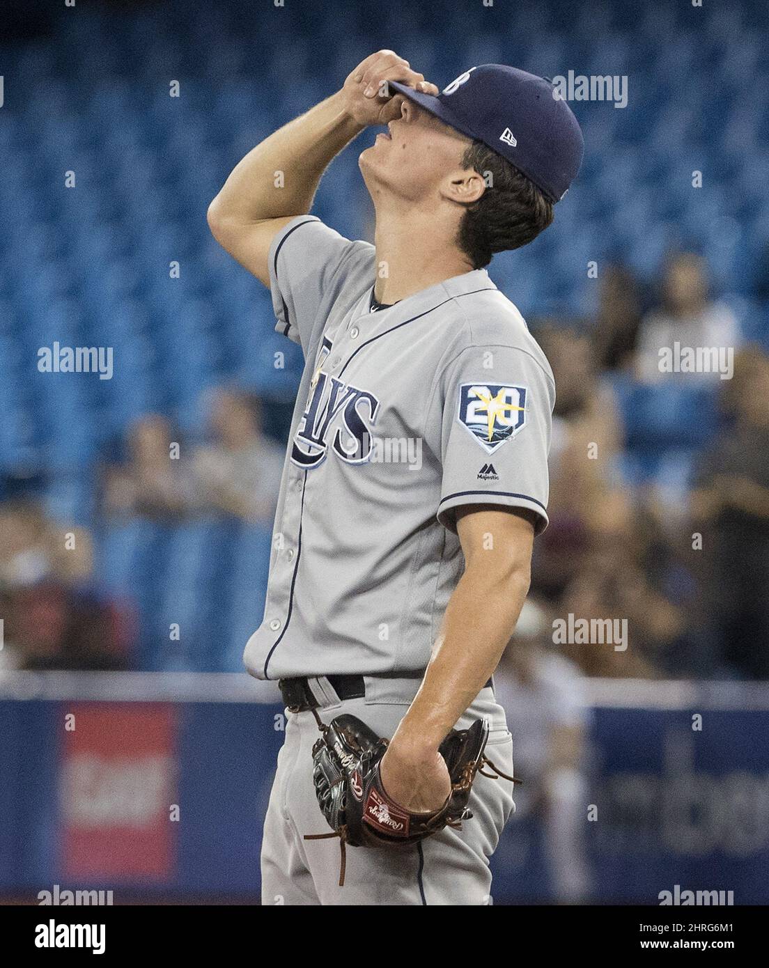 Tampa Bay Rays starting pitcher Tyler Glasnow reacts after giving up a ...